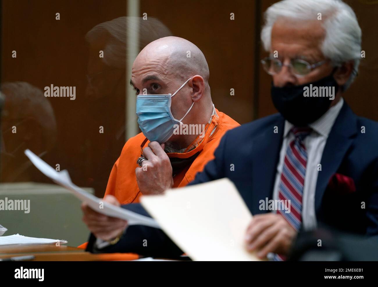 Michael Thomas Gargiulo, left, listens to his defense attorney Daniel ...