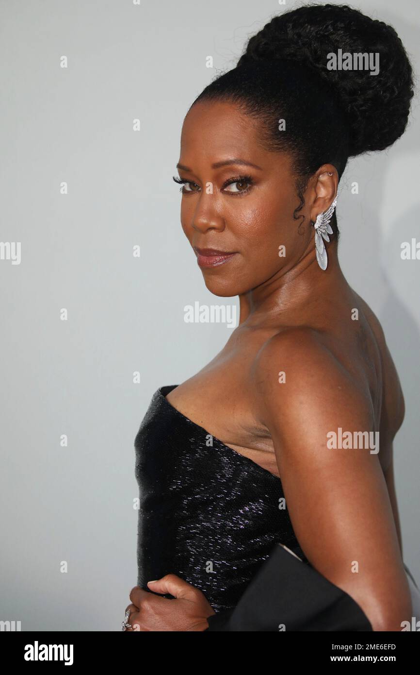 Regina King poses for photographers upon arrival at the amfAR Cinema ...