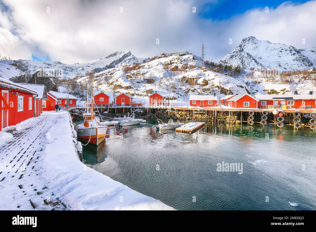 Amazing morning seascape of Norwegian sea and cityscape of Nusfjord ...