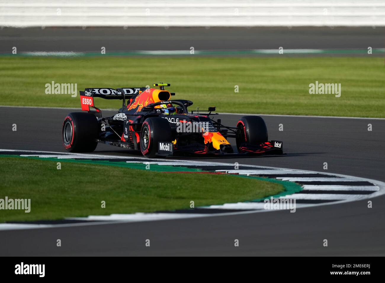 Red Bull driver Sergio Perez of Mexico steers his car during the qualifying session ahead of ...