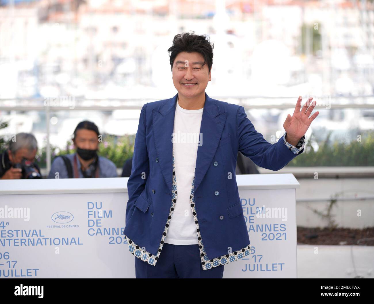 Song Kan-ho poses for photographers at the photo call for the film ...