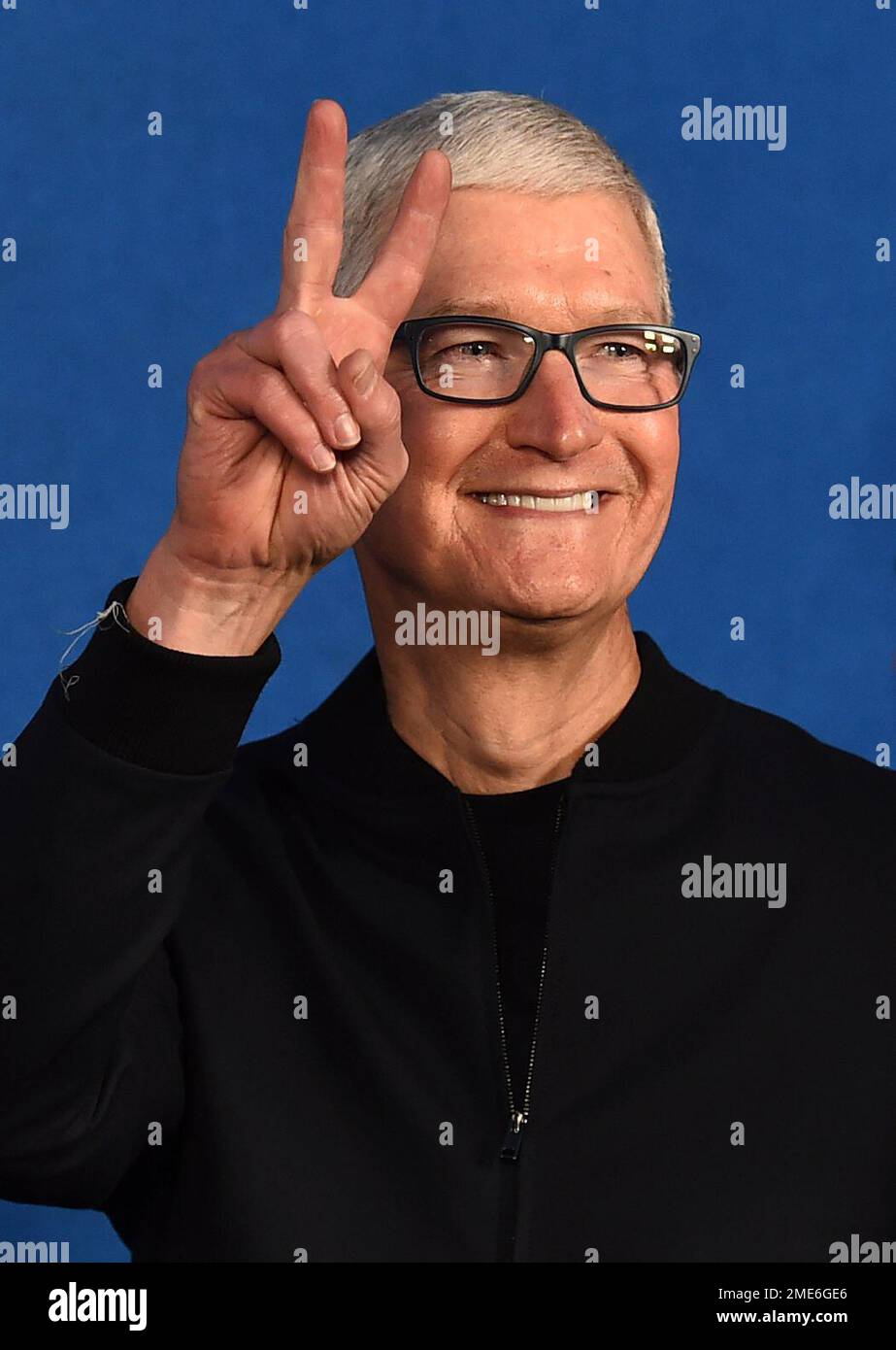 Tim Cook arrives at the premiere of the second season of "Ted Lasso" on ...