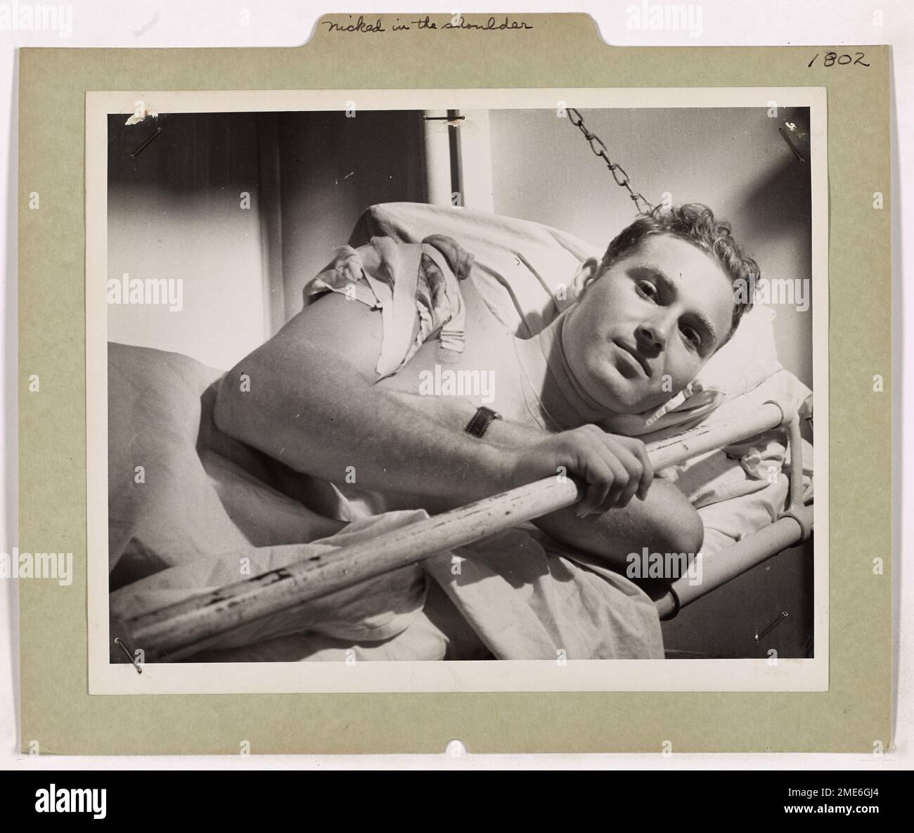 Coast Guardsman Kenneth Quick of Flint, Michigan, remains cheerful ...