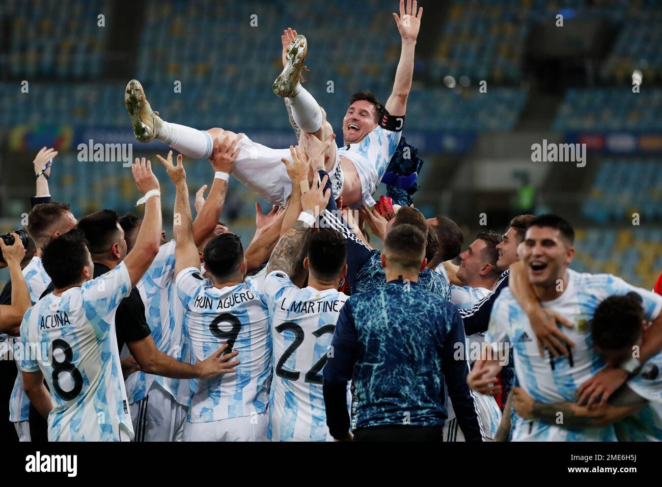 Teammates lift Argentina's Lionel Messi after their 1-0 victory over ...