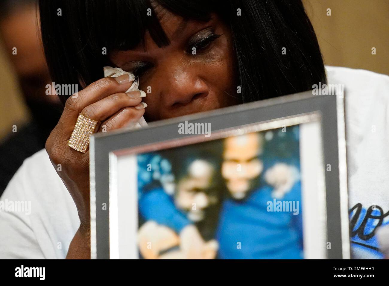 Robyn Williams, sister of Byron Williams, cries during a news ...