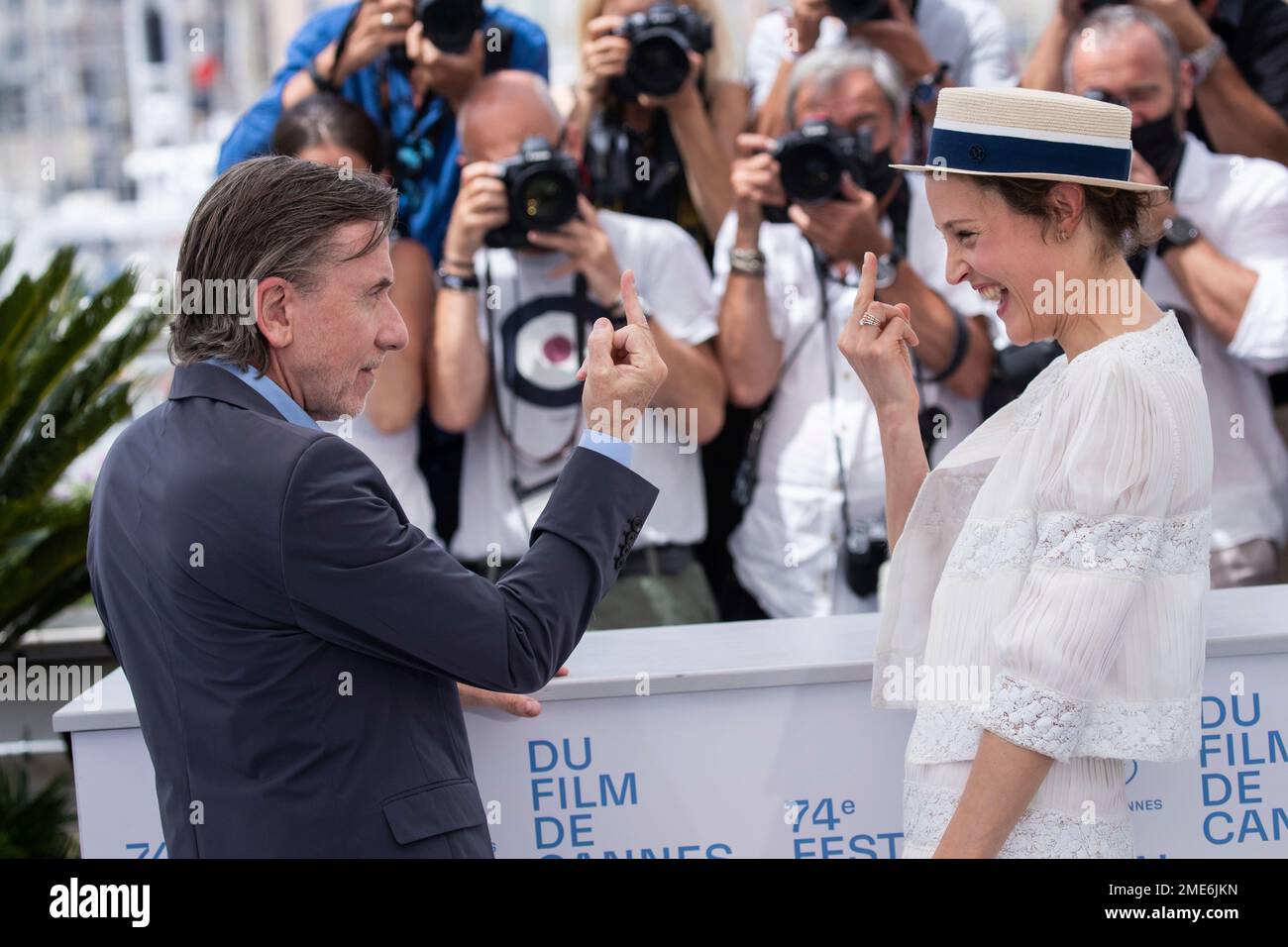 Tim Roth, left, and Vicky Krieps pose for photographers at the photo ...