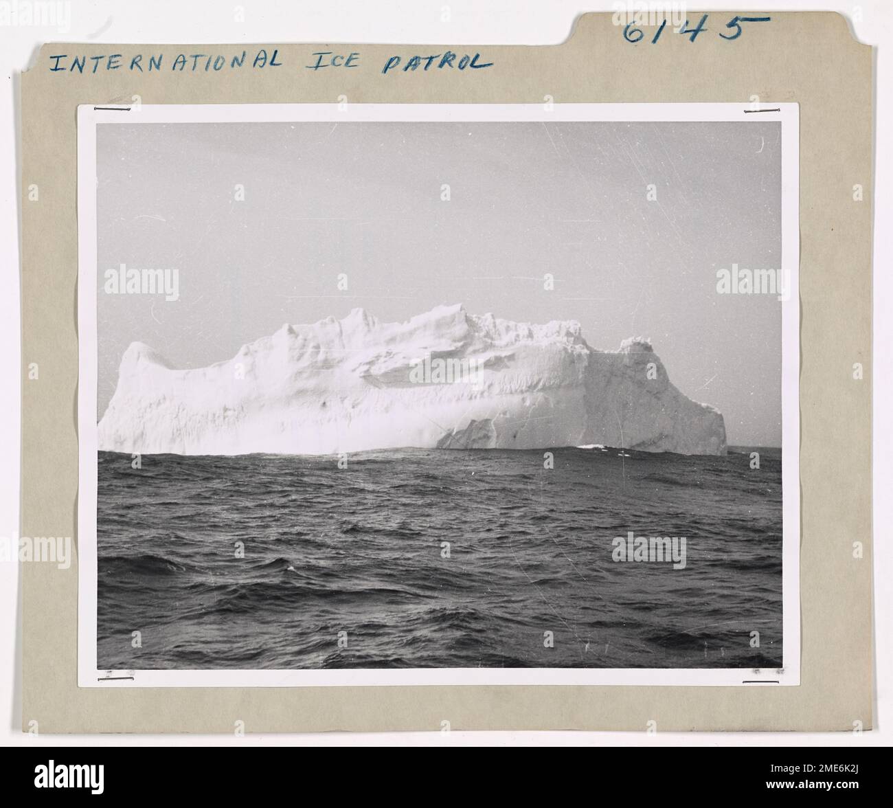 A massive iceberg off Newfoundland is branded with colorful dyes by the ...