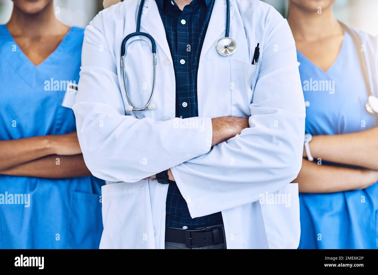 Standing together for health. three medical practitioners standing ...