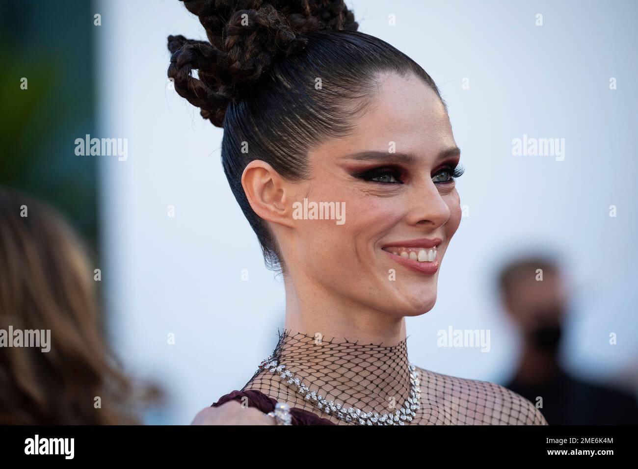 Coco Rocha poses for photographers upon arrival at the premiere of the ...