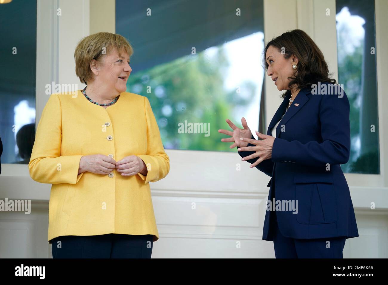 Vice President Kamala Harris greets German Chancellor Angela Merkel as ...