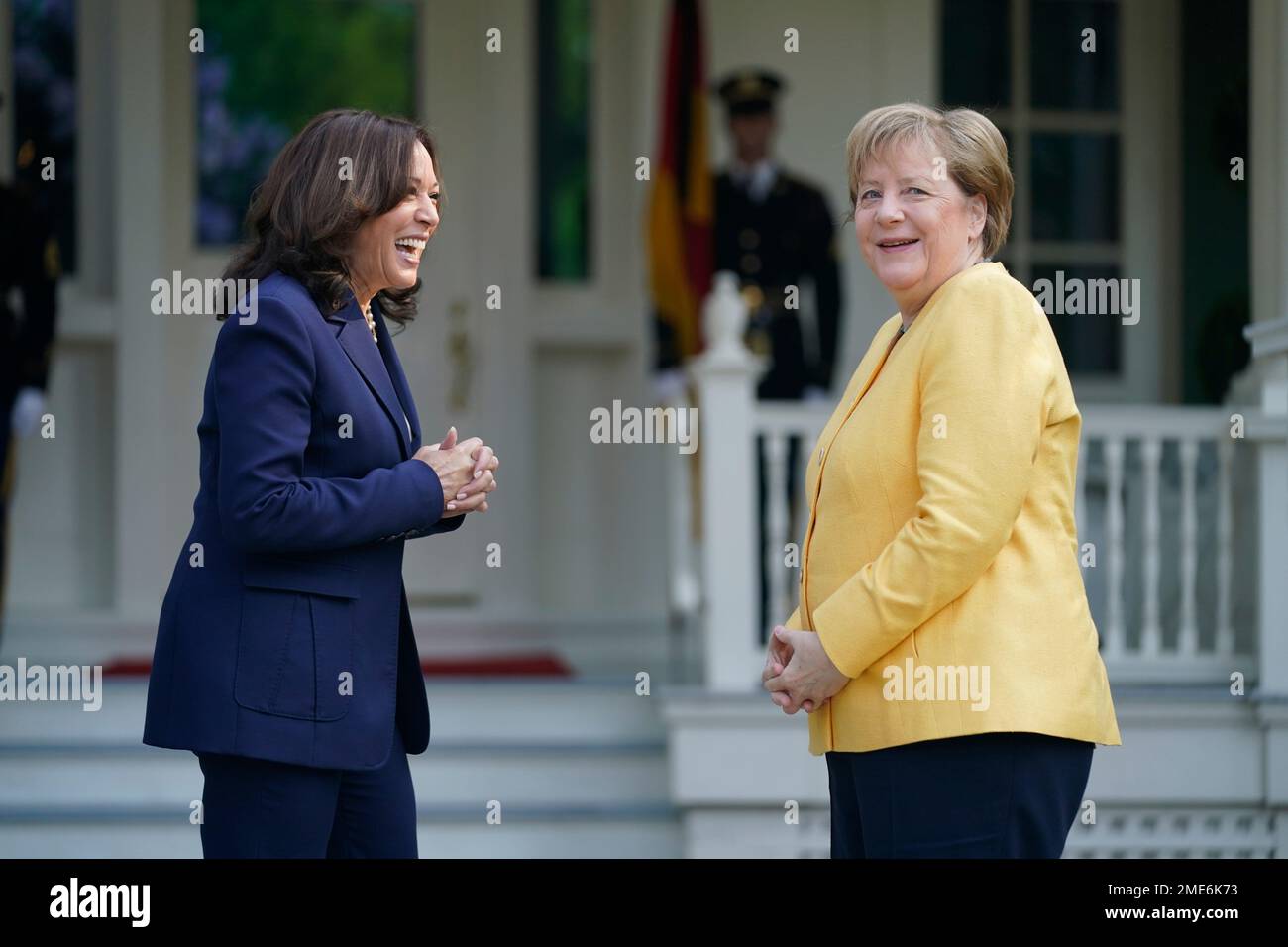 Vice President Kamala Harris greets German Chancellor Angela Merkel as ...