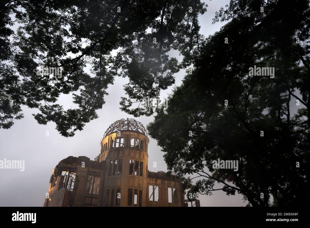 A canopy of trees frame the Atomic Bomb Dome in Hiroshima, western ...