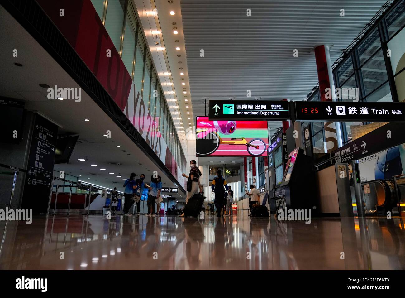Tokyo 2020 Olympics and Paralympics signs are displayed at the international arrival lobby at ...
