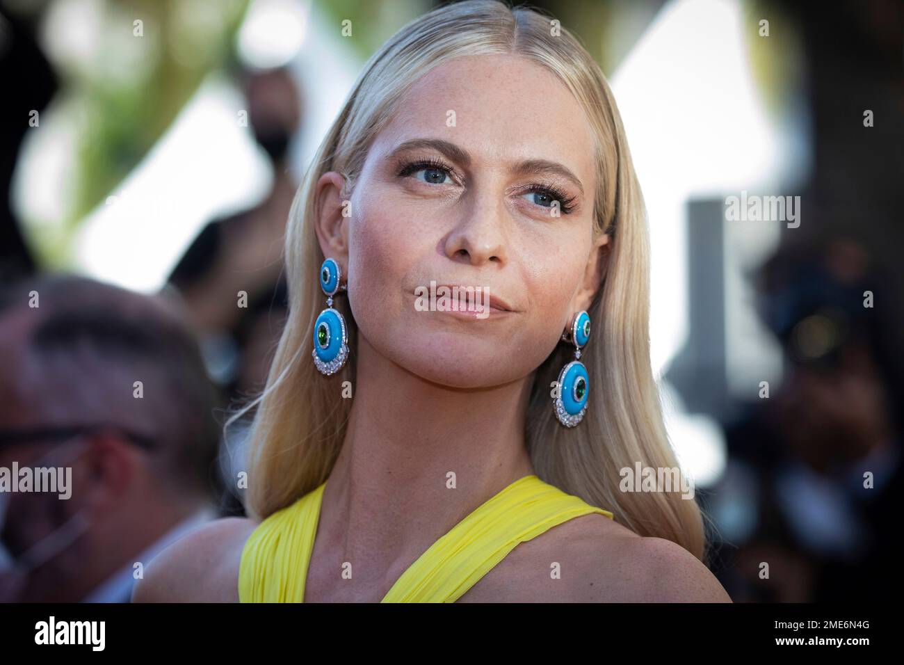 Poppy Delevingne poses for photographers upon arrival at the premiere ...