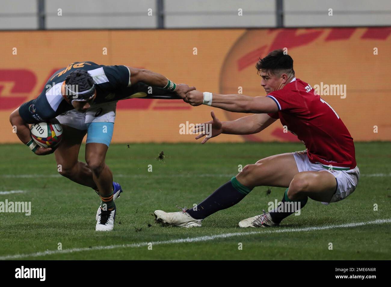Cheslin Kolbe of the South Africa 'A' is caught by Louis Rees-Zammit of ...