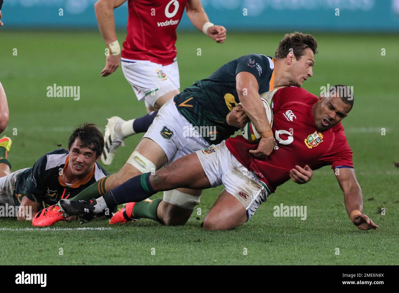 Kyle Sinckler of the British & Irish Lions is tackled by Rynhardt ...
