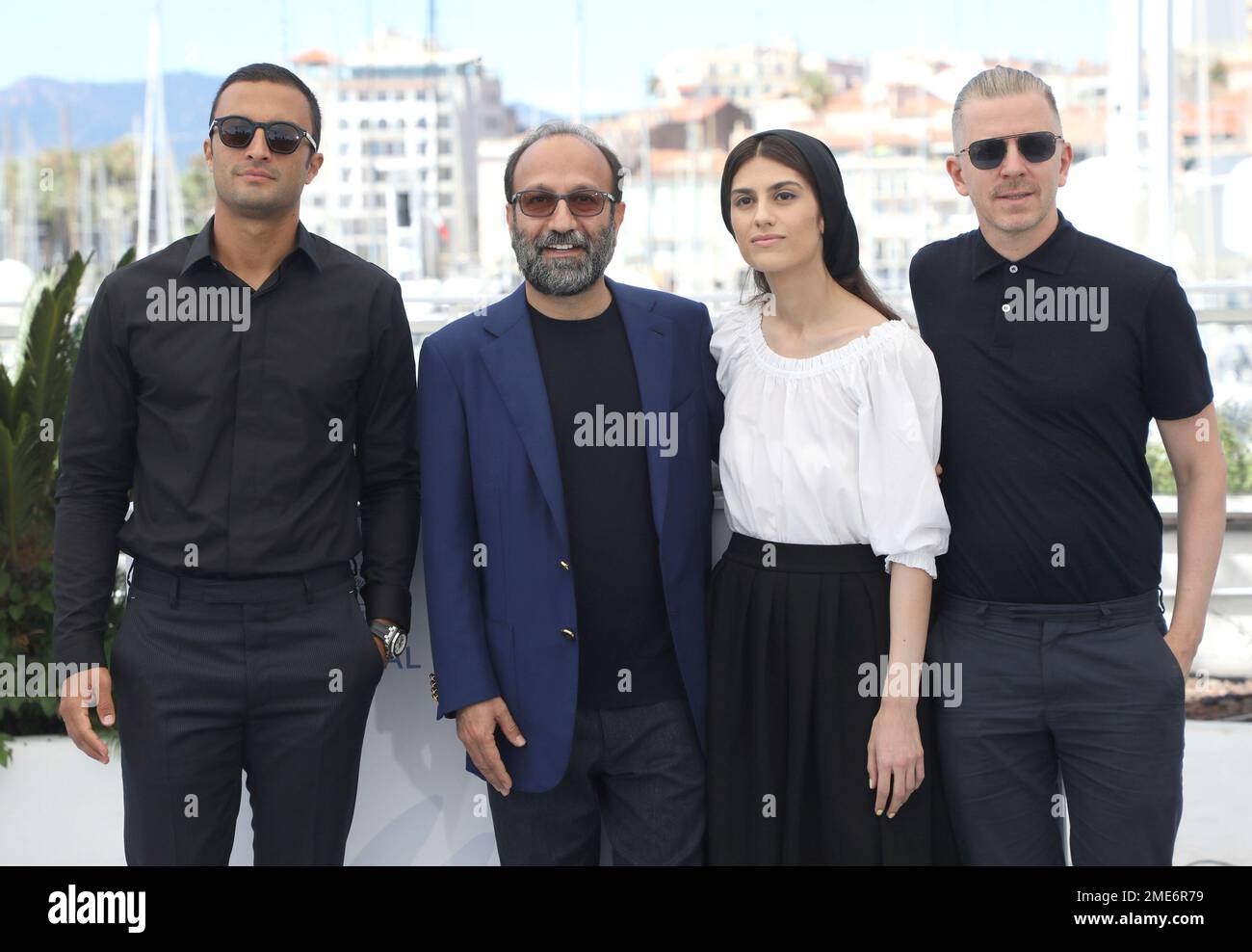 Amir Jadidi, director Asghar Farhadi, Sarina Farhadi, and Alexandre ...