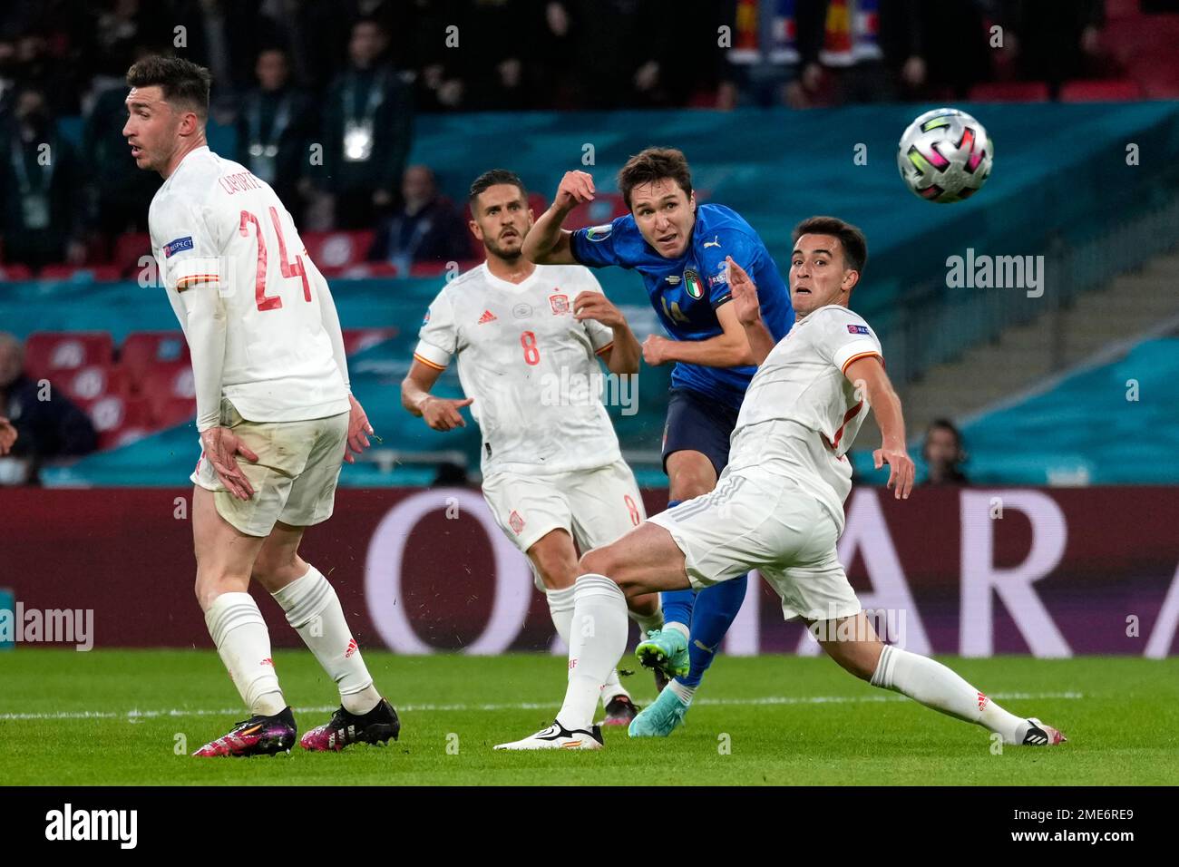 Italy's Federico Chiesa, second right, scores his side's opening goal ...