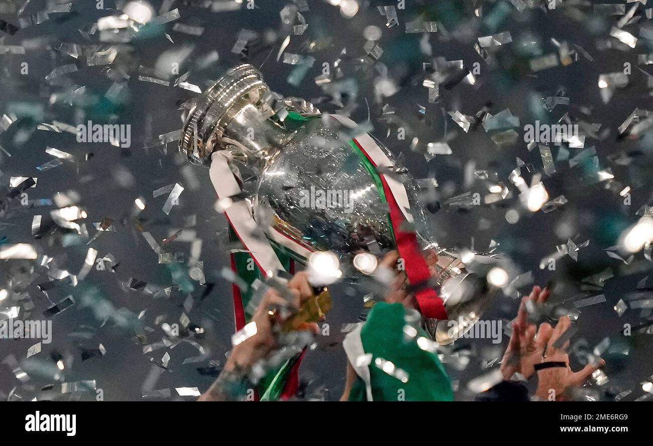 Italy's team celebrates with the trophy after winning the Euro 2020 ...