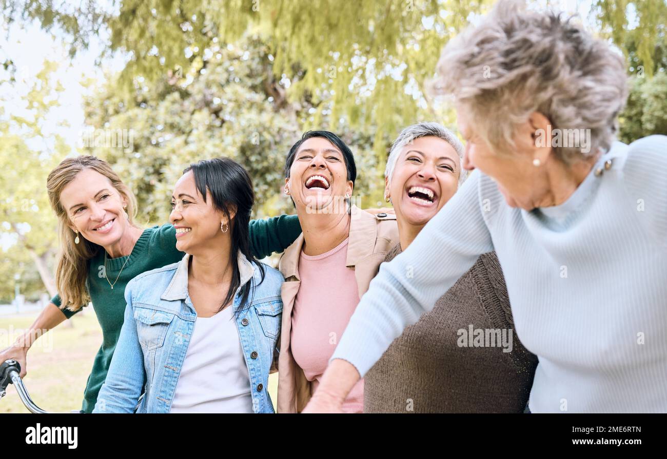 Senior women, park and friends laughing at funny joke, crazy meme or ...
