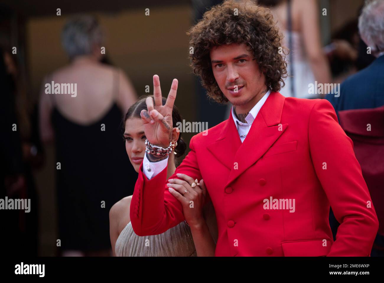 Julian Perretta and Kambree Dalton pose for photographers upon arrival ...