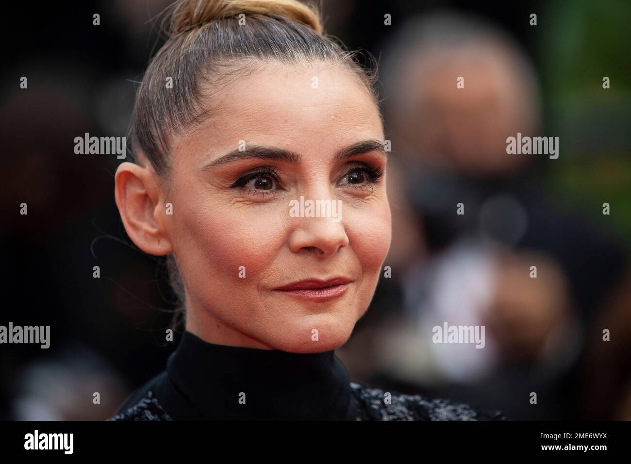 Clotilde Courau poses for photographers upon arrival at the premiere of ...