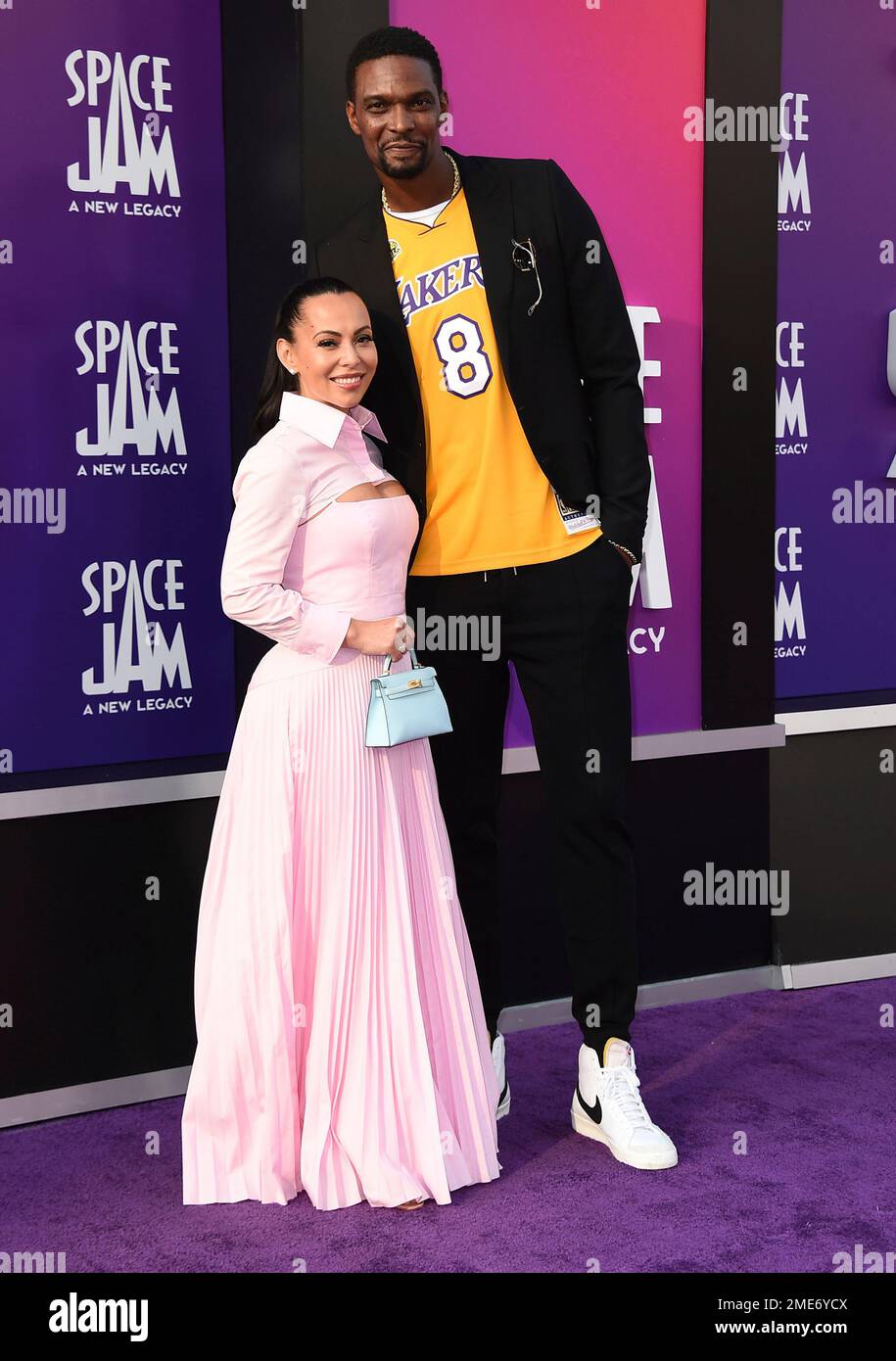 Chris Bosh, right, and Adrienne Williams Bosh, arrive at the world ...