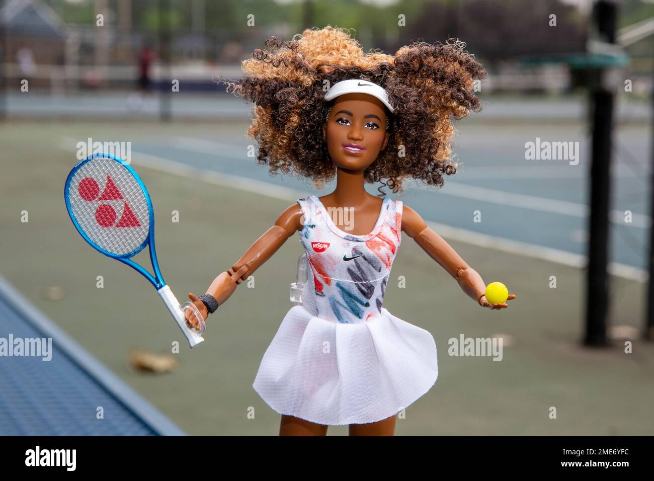 A Naomi Osaka Barbie doll is seen on a tennis court in Rutherford, New ...