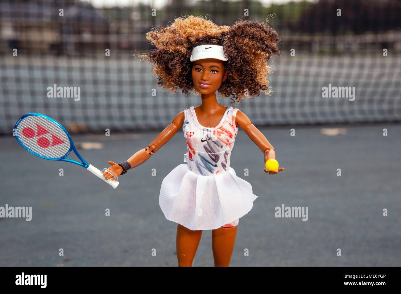 A Naomi Osaka Barbie doll is seen on a tennis court in Rutherford, New ...