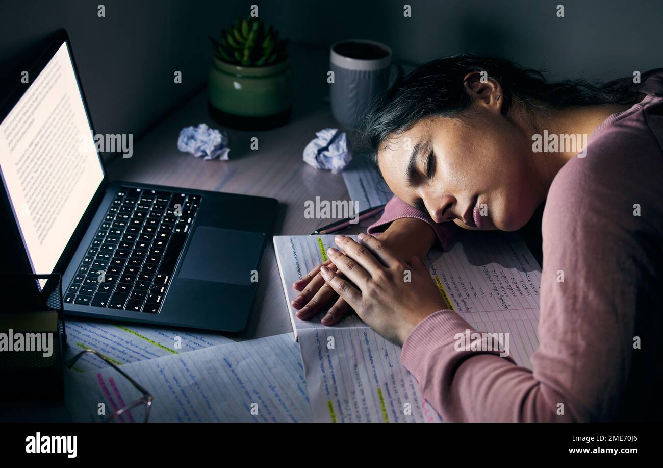 Woman, laptop and student sleeping, night and burnout for studying ...