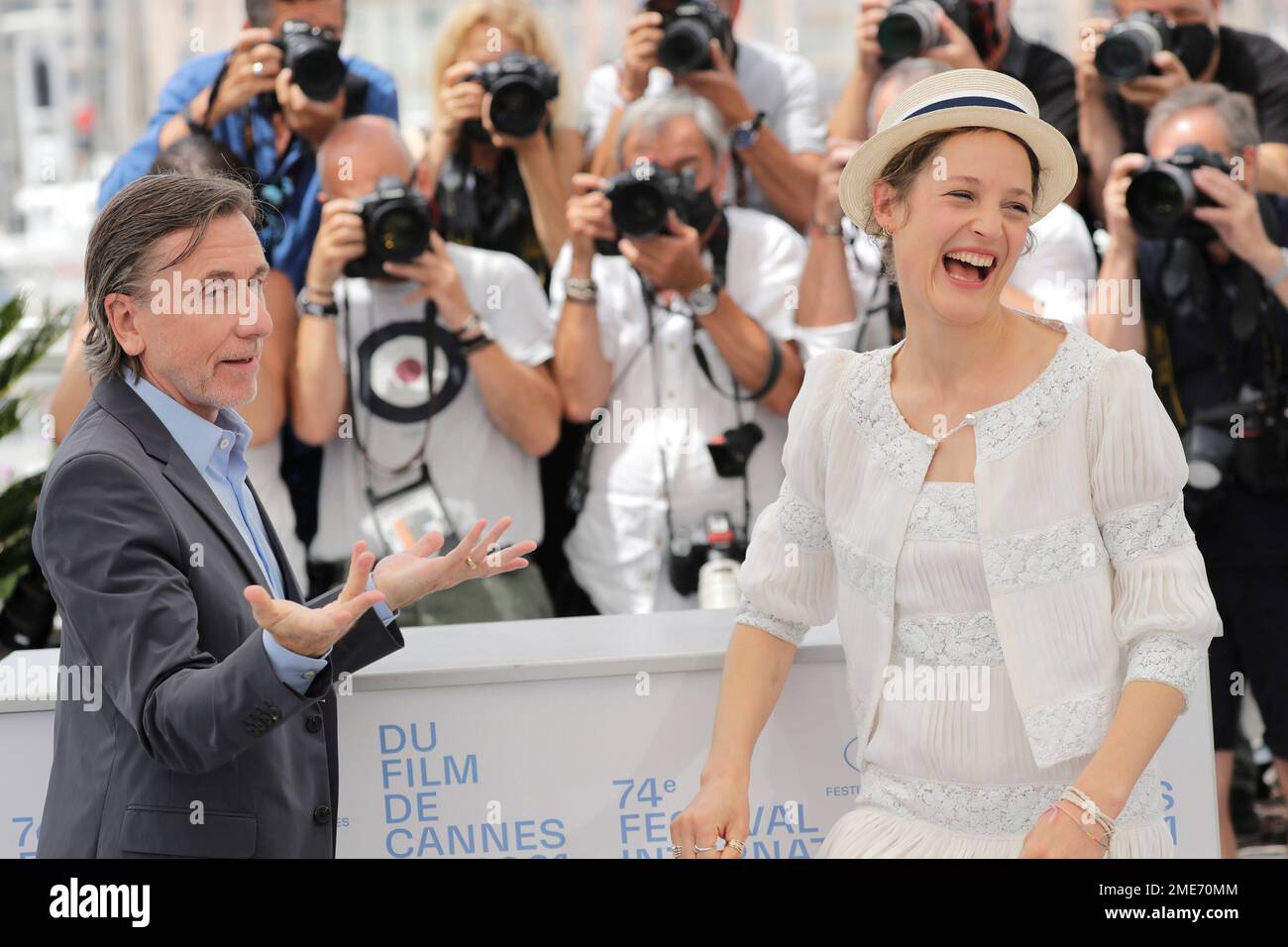 Tim Roth, left, and Vicky Krieps pose for photographers at the photo ...