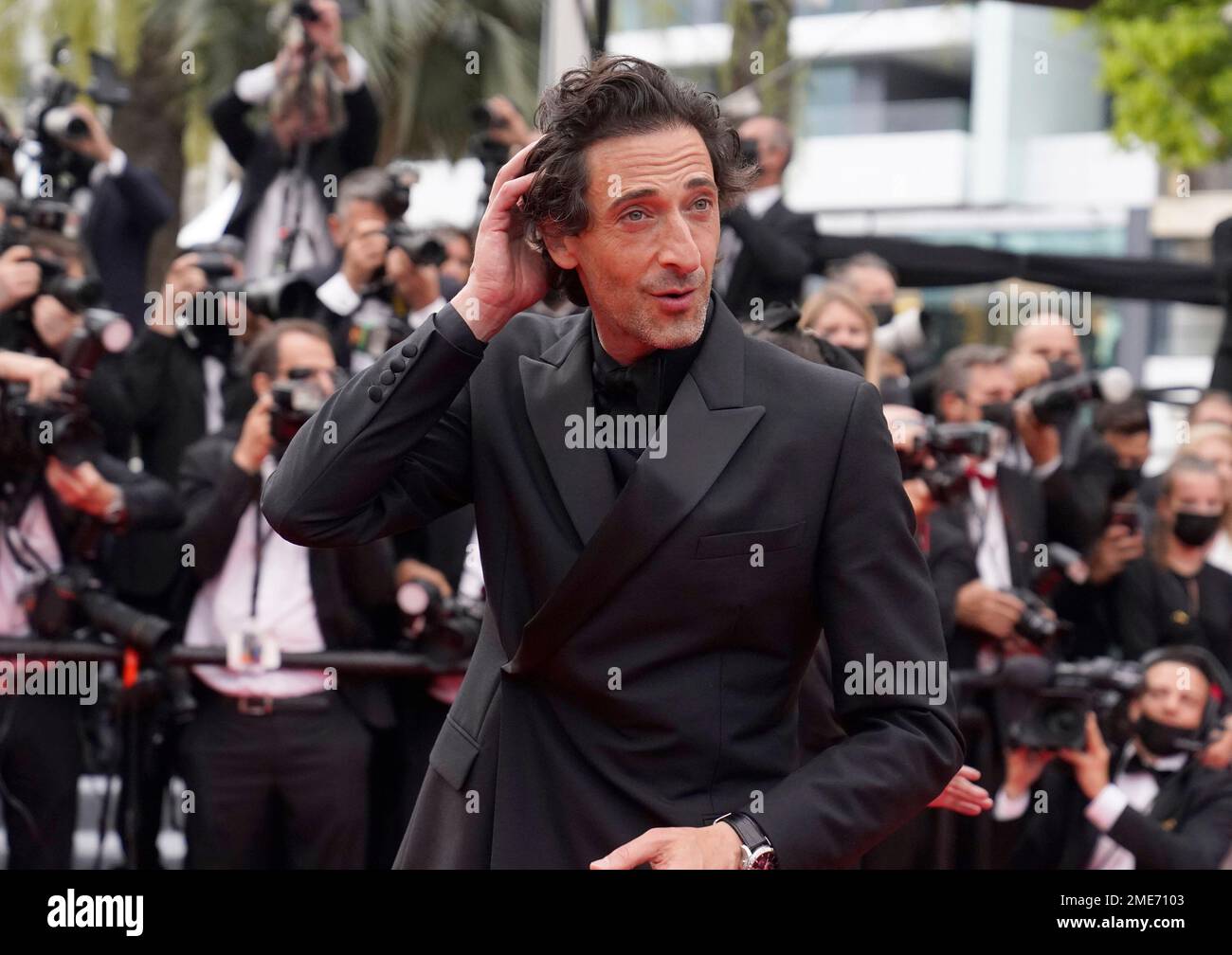 Adrien Brody poses for photographers upon arrival at the premiere of ...