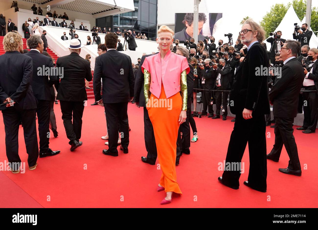 Tilda Swinton, center, poses for photographers upon arrival at the ...