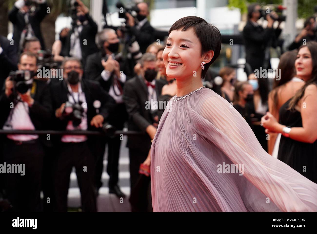 Huang Miyi poses for photographers upon arrival at the premiere of the ...