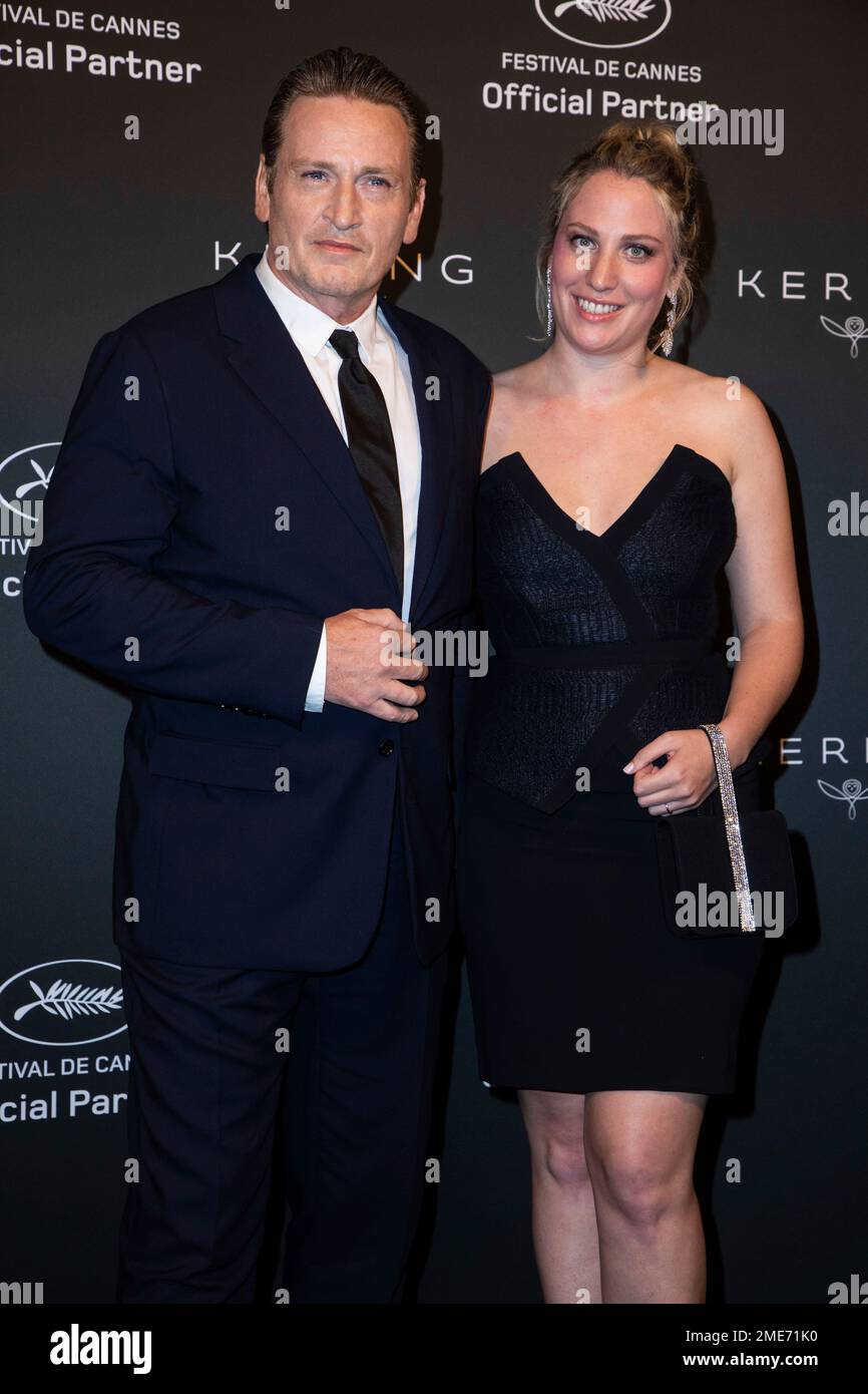 Benoit Magimel and Margot Pelletier pose for photographers upon arrival ...