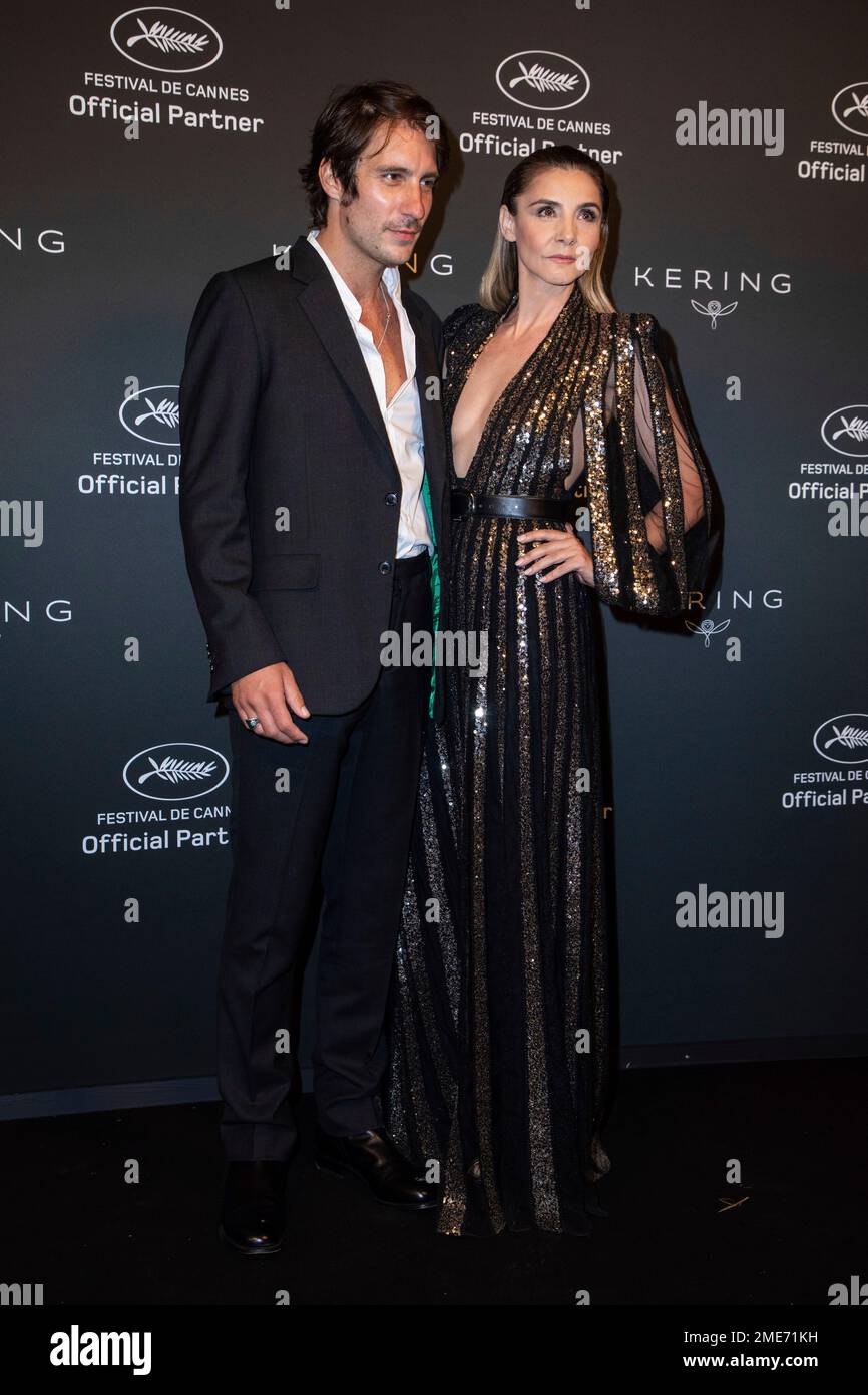 Maxime Roy and Clotilde Courau pose for photographers upon arrival at ...