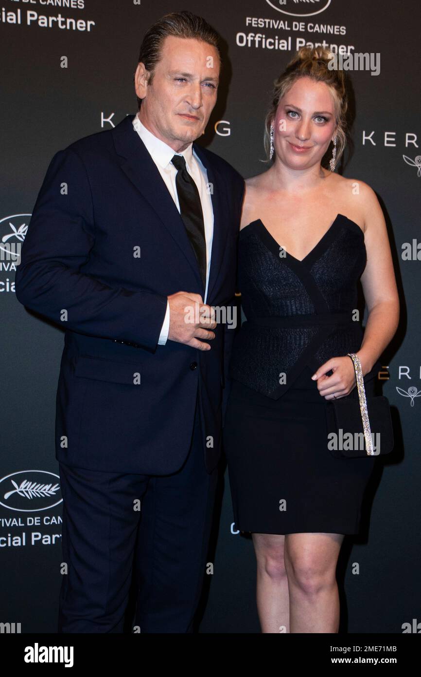 Benoit Magimel and Margot Pelletier pose for photographers upon arrival ...