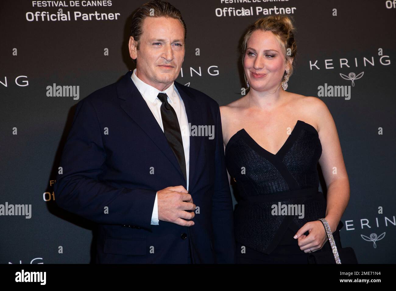 Benoit Magimel and Margot Pelletier pose for photographers upon arrival ...