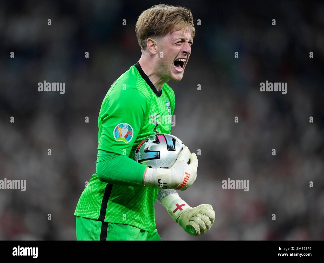 England's goalkeeper Jordan Pickford reacts after catching a ball ...