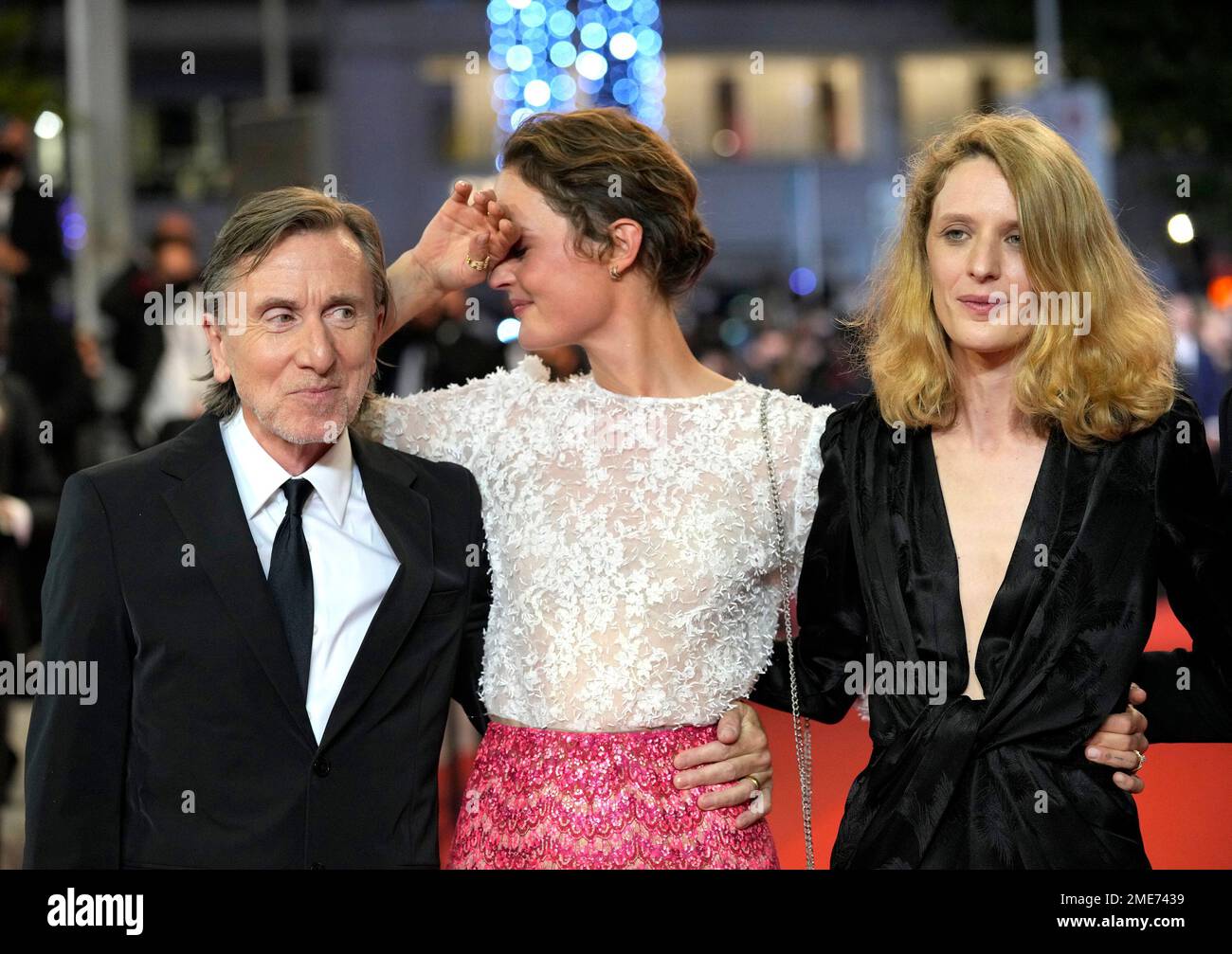 Tim Roth, from left, Vicky Krieps, and director Mia Hansen-Love pose ...