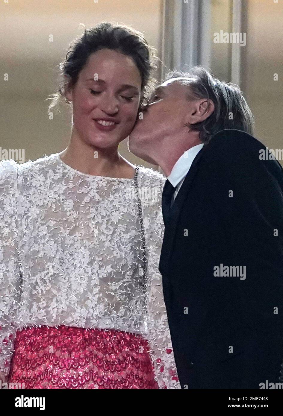 Vicky Krieps, left, and Tim Roth pose for photographers upon arrival at ...