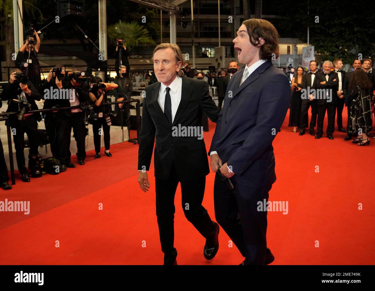 Tim Roth, left, and Michael Cormac Roth pose for photographers upon ...