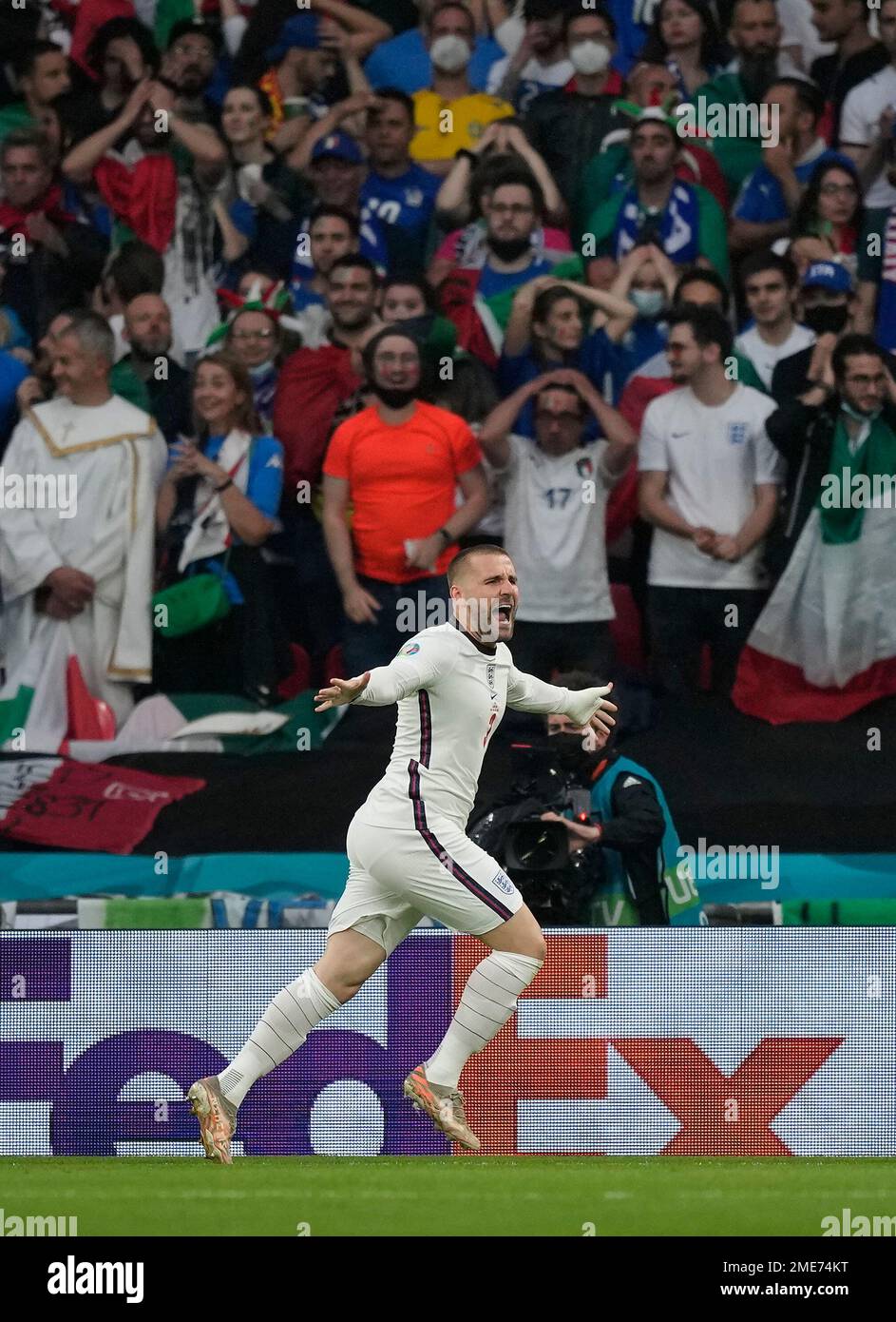 England's Luke Shaw celebrates after scoring the opening goal during ...