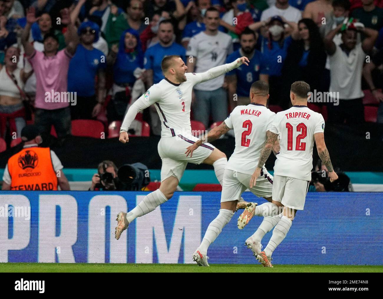 England's Luke Shaw, left, celebrates after scoring the opening goal ...