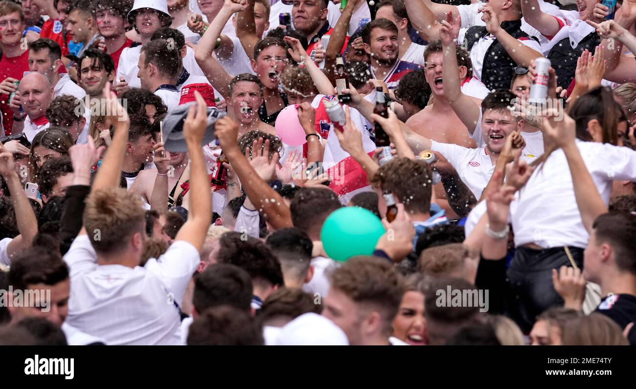 Fans cheer as they gather near Trafalgar Square in London, Sunday, July ...
