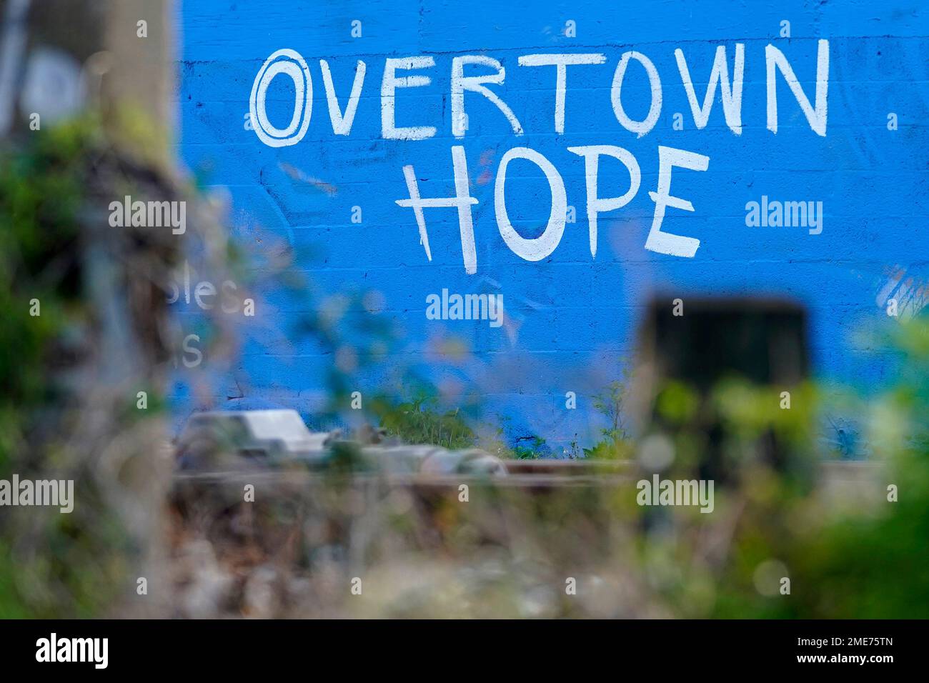 A mural by artist Kyle Holbrook reading Overtown Hope is painted on a ... A mural by artist Kyle Holbrook reading Overtown Hope is painted on a ...