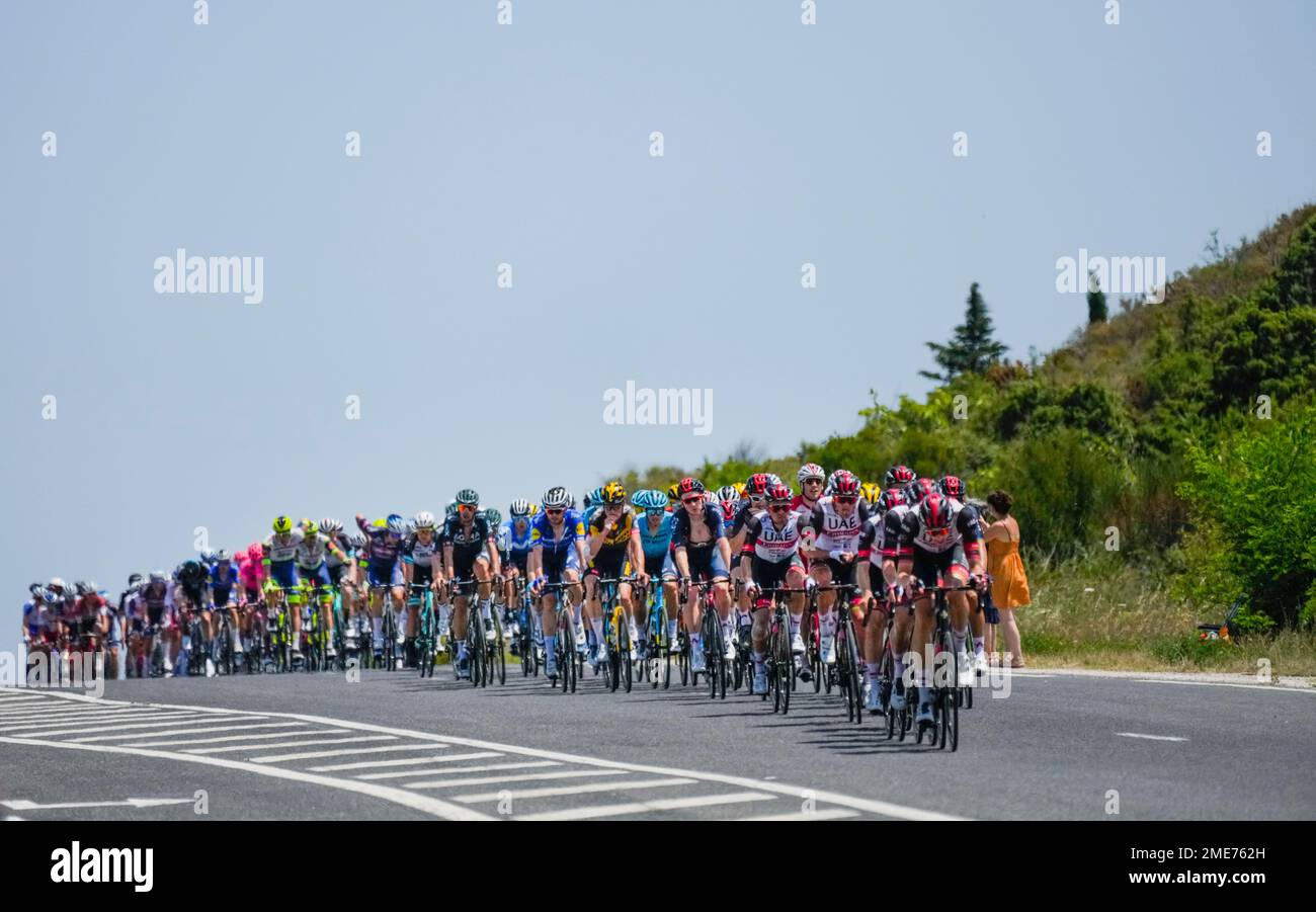 The peloton rides during the fifteenth stage of the Tour de France ...