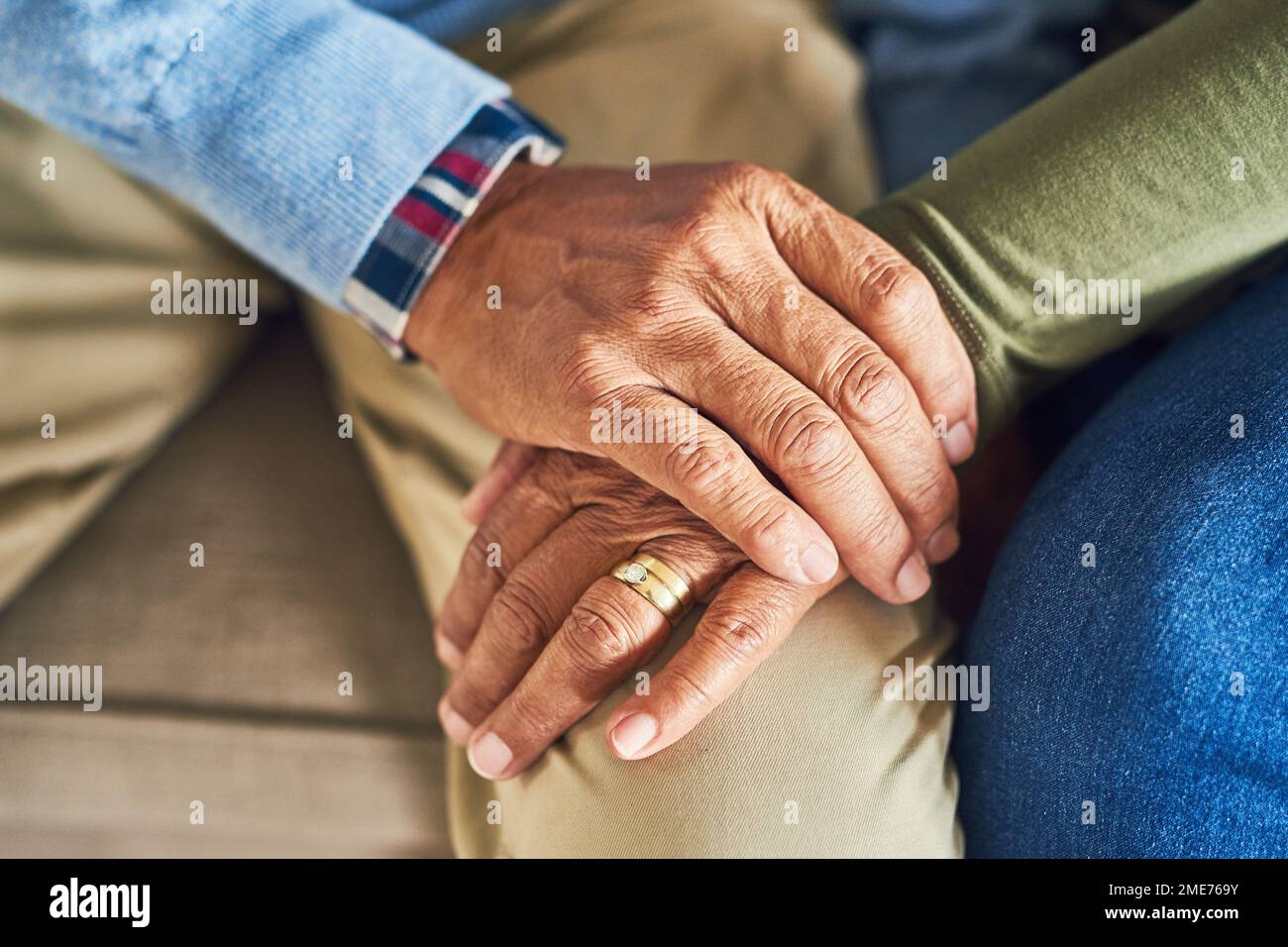 hand in hand through it all. an unrecognizable senior couple holding ...