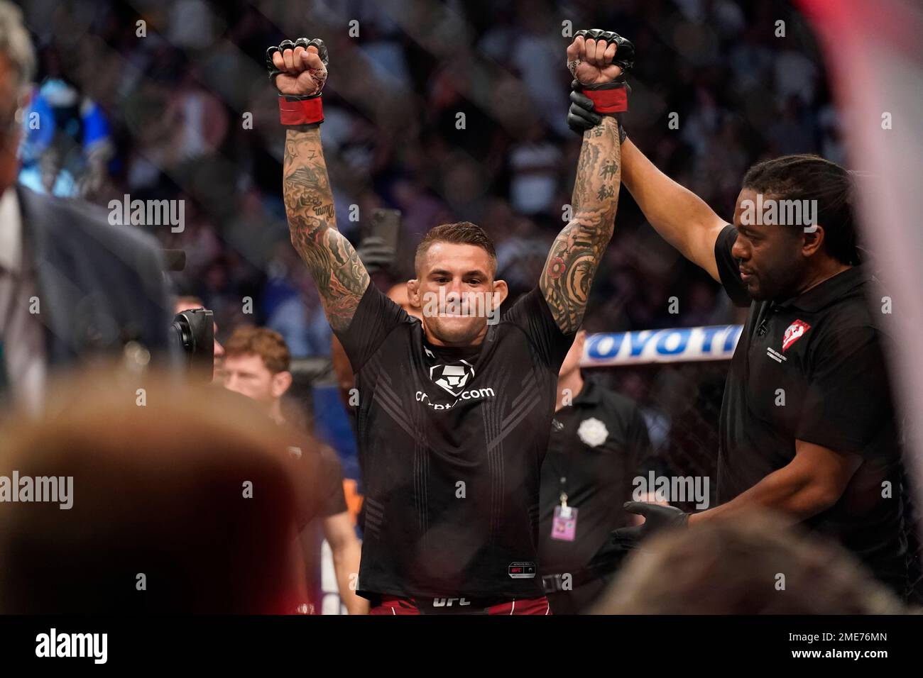 Dustin Poirier is declared the winner after Conor McGregor was injured ...