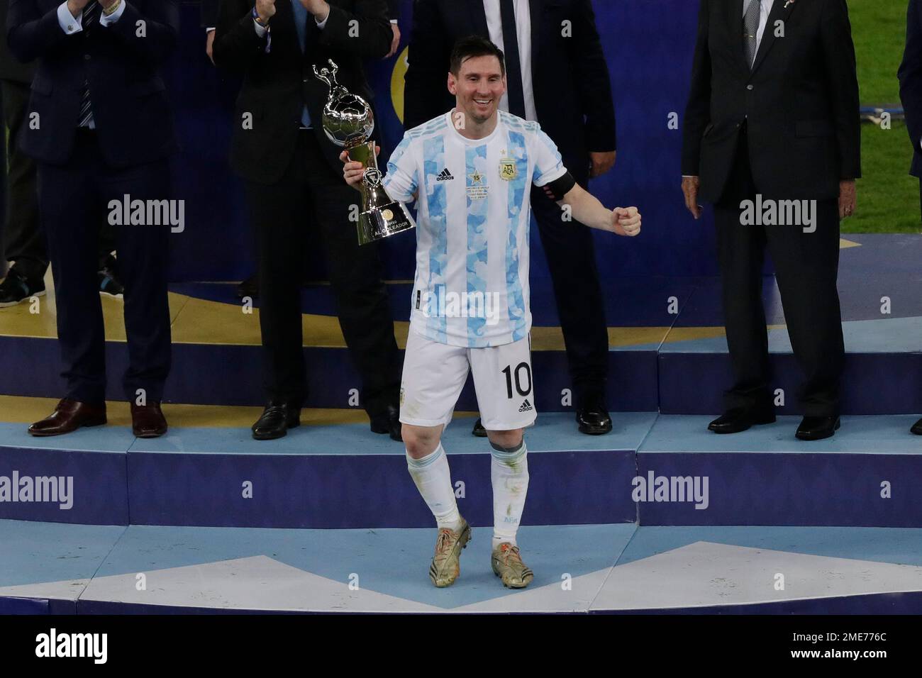 Argentina's Lionel Messi celebrates with the trophy for the top scorer ...